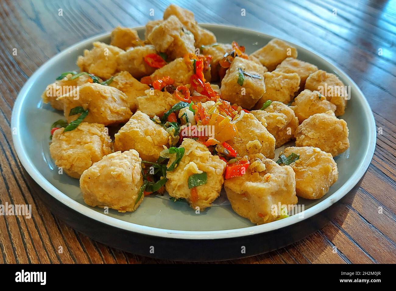 Tahu Pedas, Hot Chili Tofu, Jakarta, Indonesia Stock Photo - Alamy