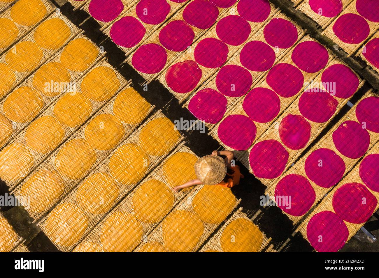 Workers are drying rice noodles in the sun Stock Photo - Alamy