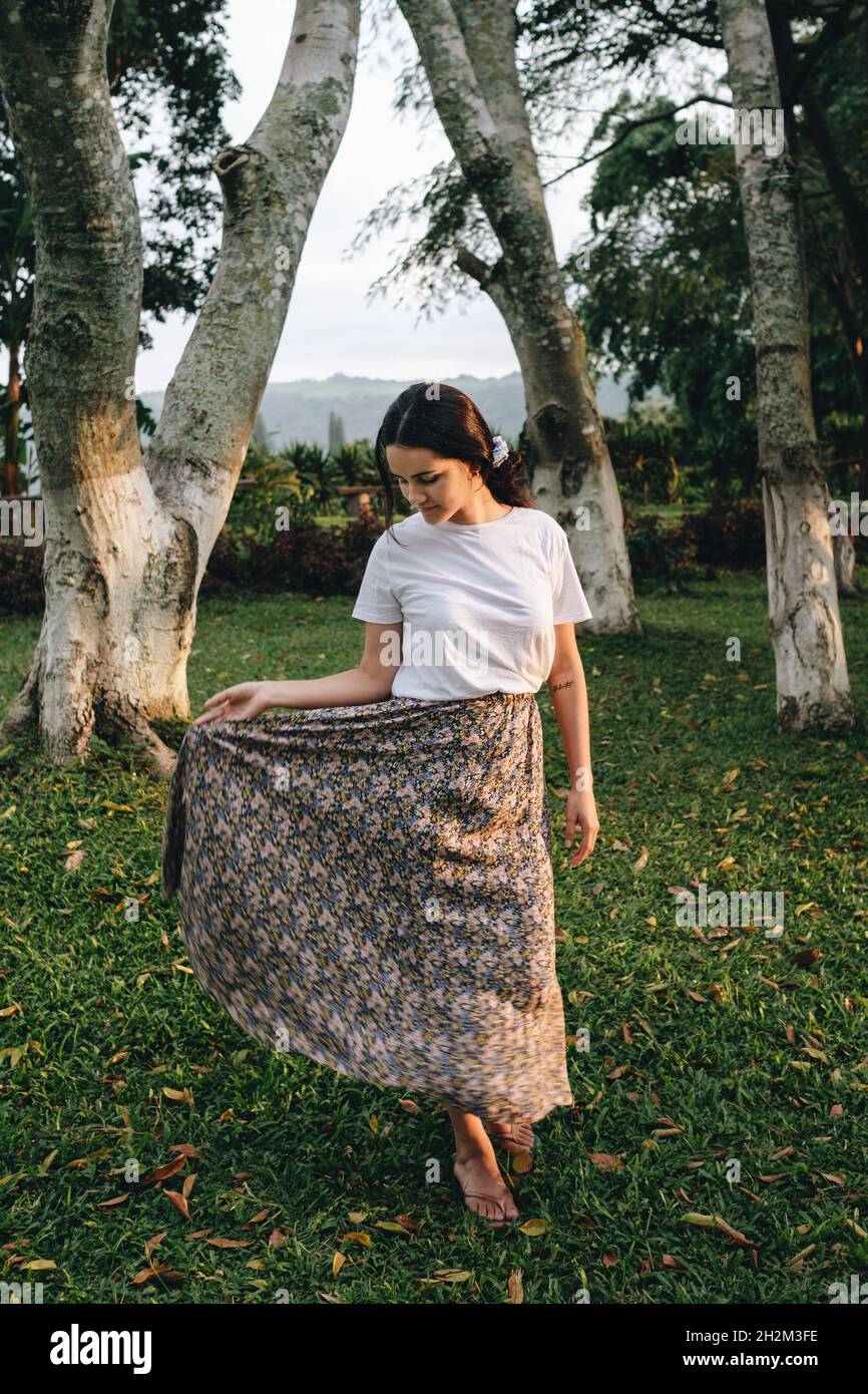 Girl walking towards me Stock Photo - Alamy
