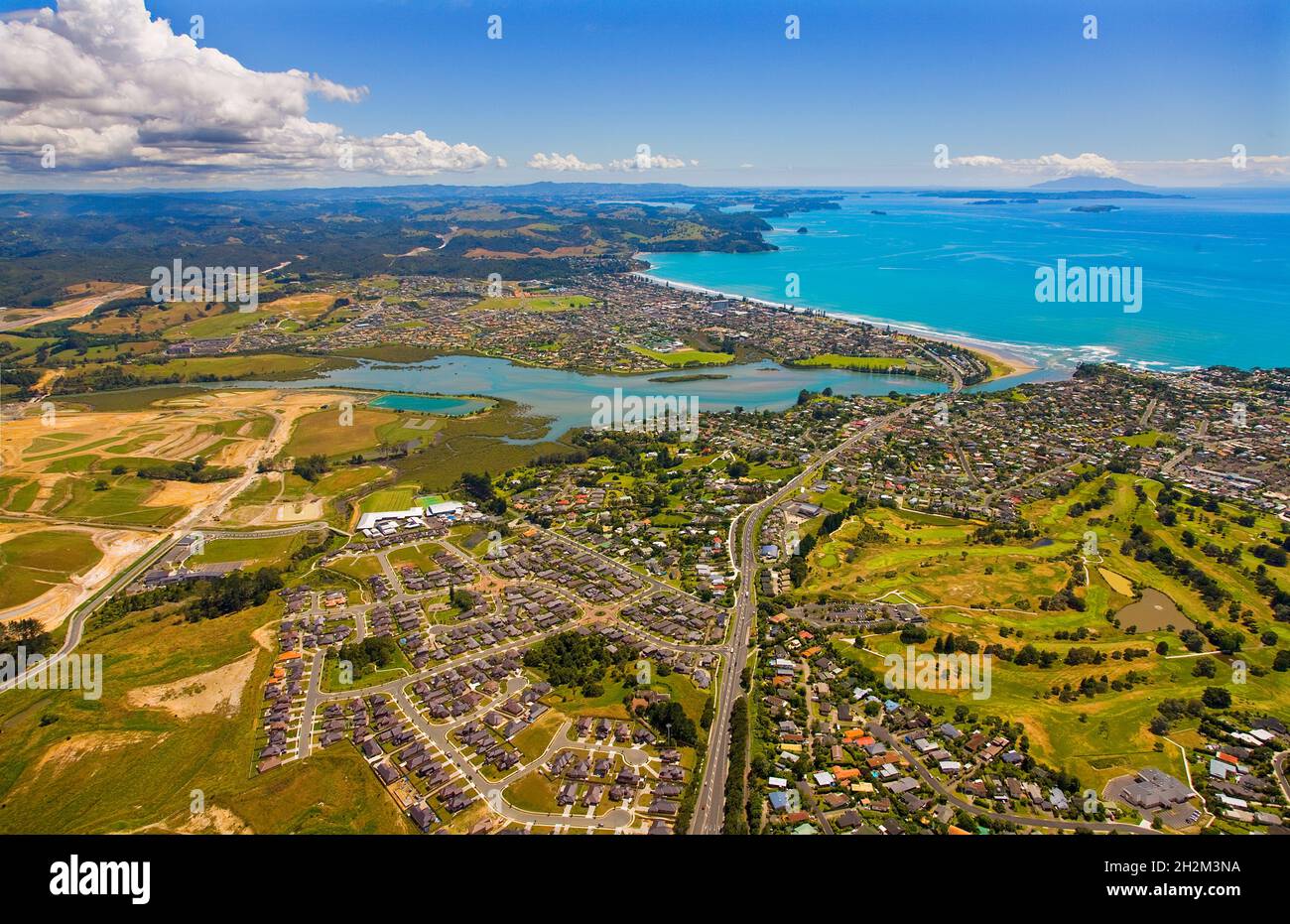 Aerial-Silverdale with Orewa beyond Stock Photo - Alamy