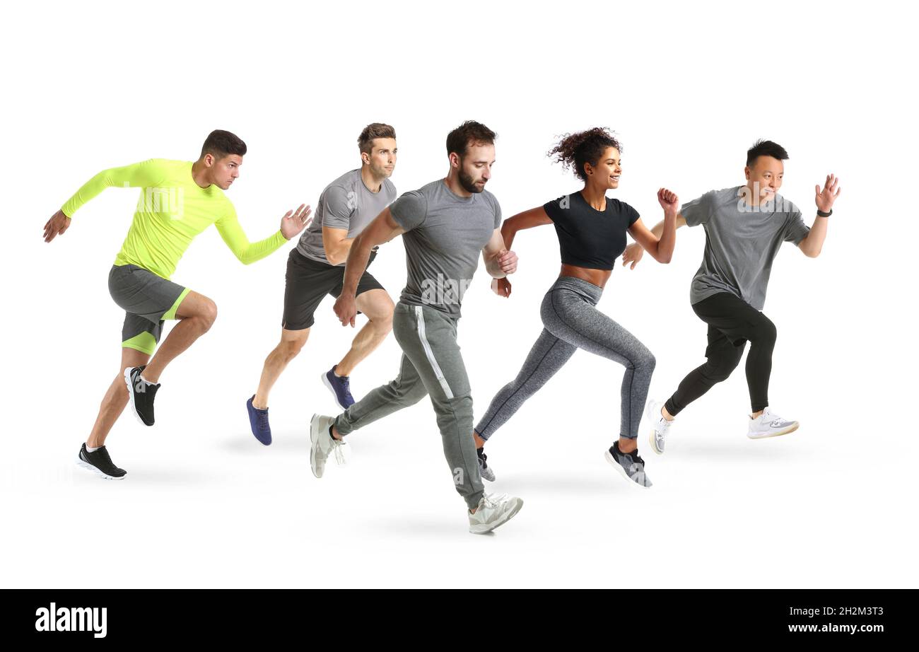 Group of sporty running people on white background Stock Photo - Alamy