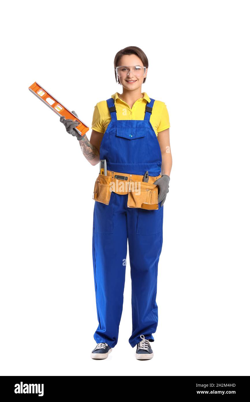 Female construction worker with builder level on white background Stock ...