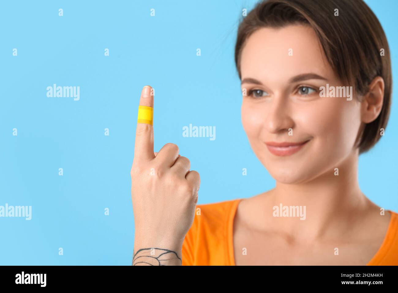 Blue plaster on finger hi-res stock photography and images - Alamy