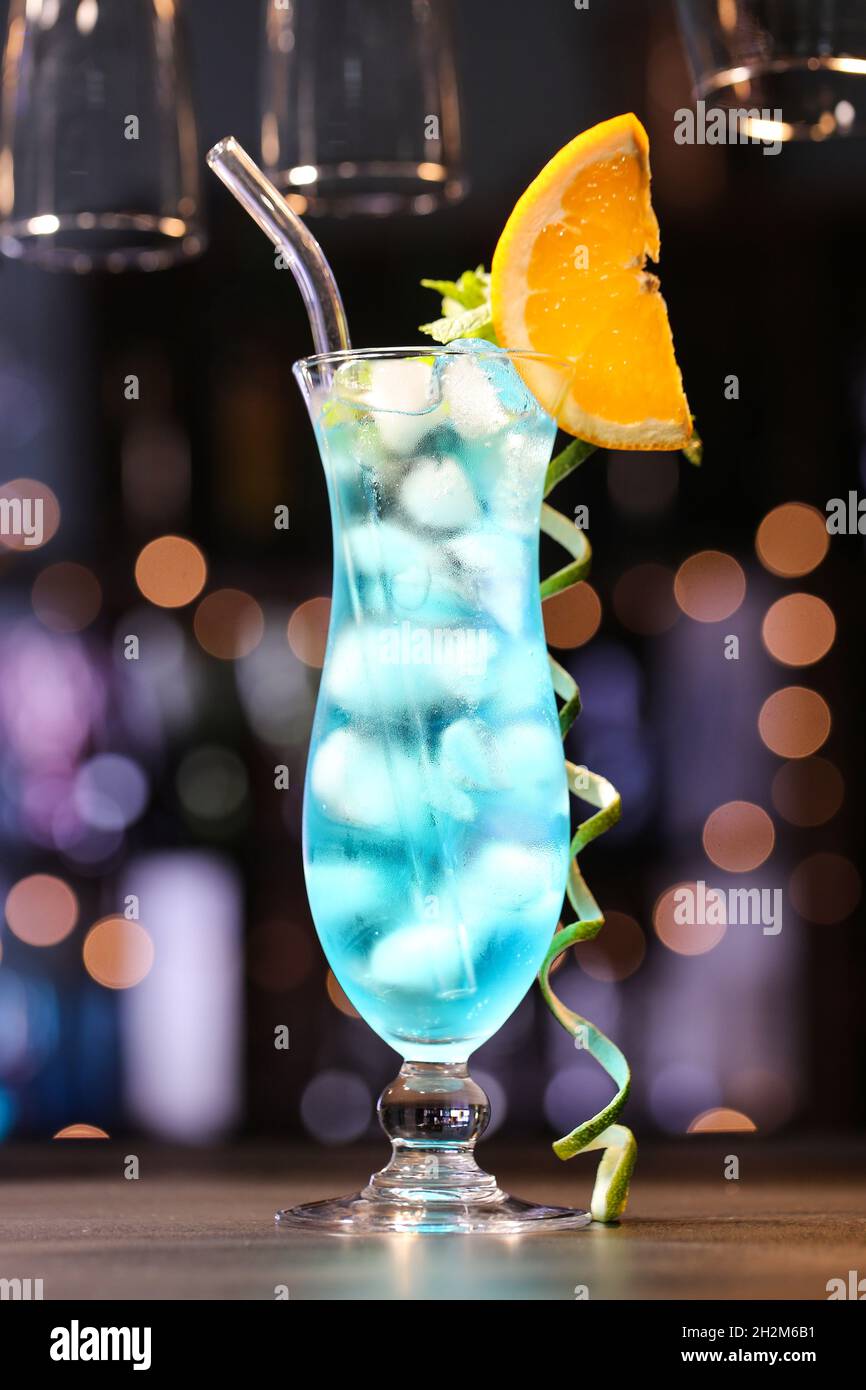 Glass of Blue Lagoon cocktail on table in bar Stock Photo - Alamy