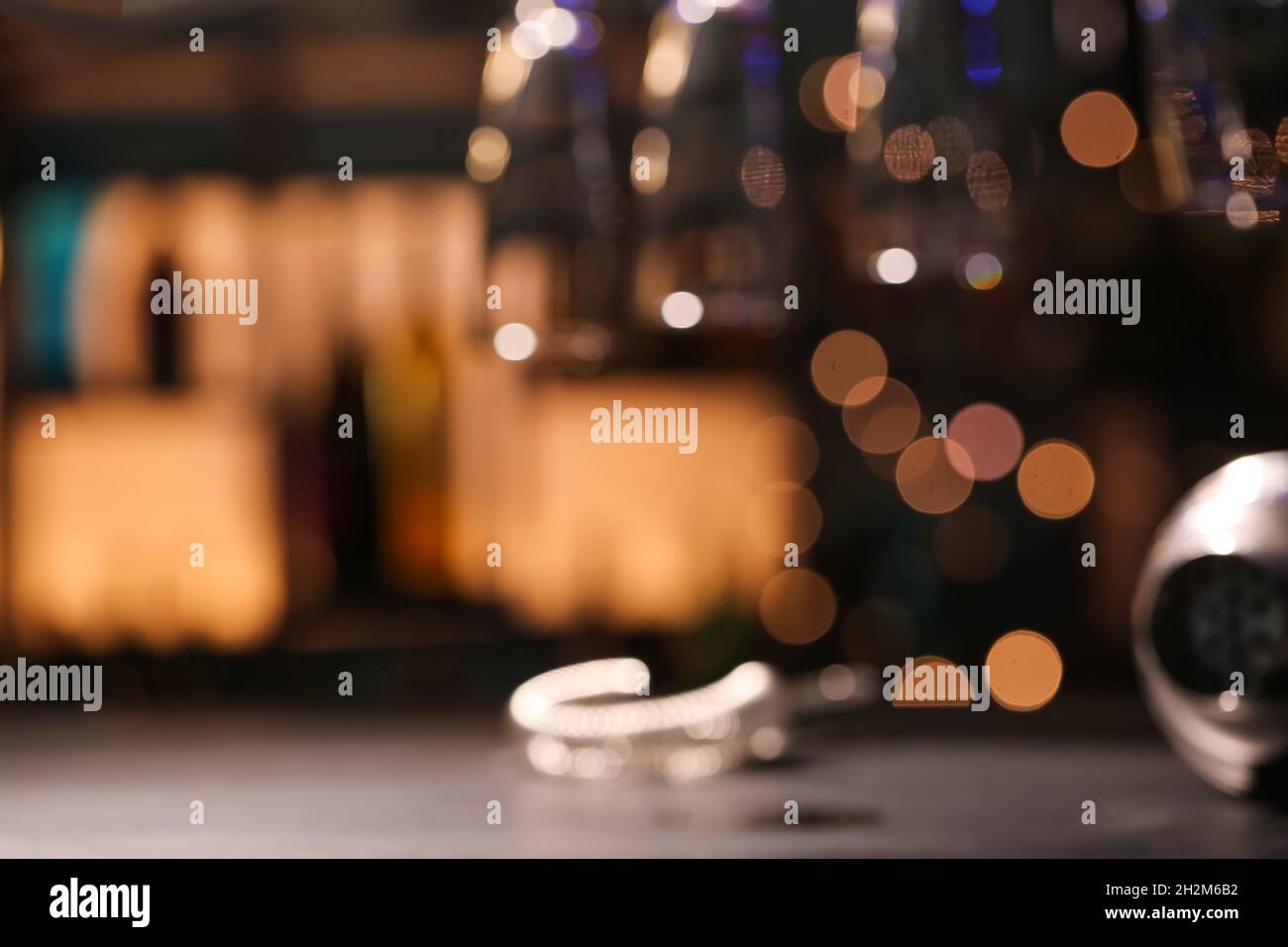 Empty table in bar, blurred view Stock Photo - Alamy