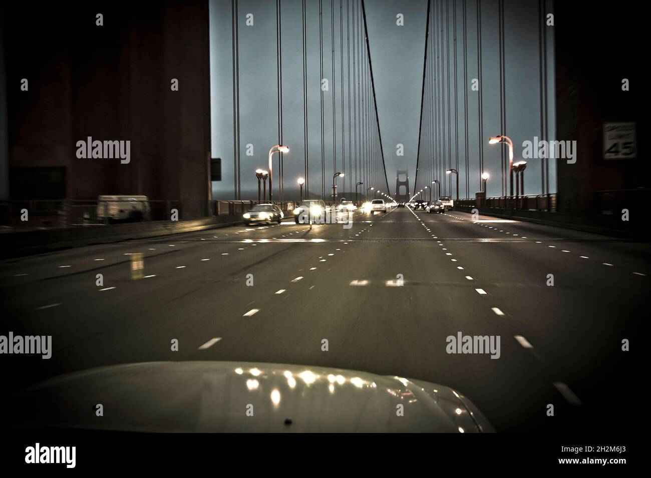 Driving on Golden Gate Bridge at night Stock Photo - Alamy