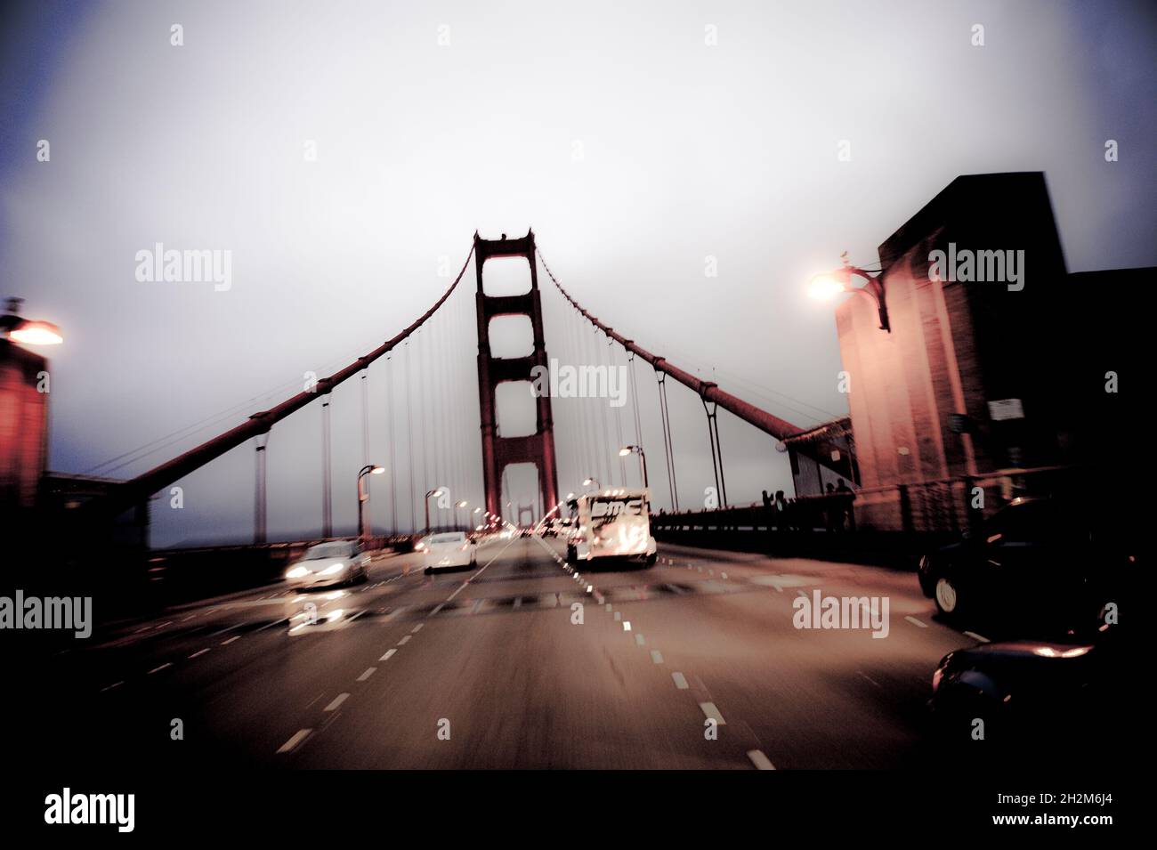 Driving on Golden Gate Bridge at night Stock Photo - Alamy