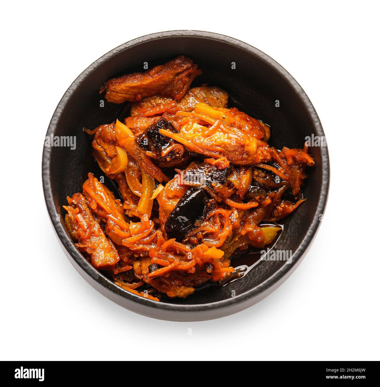 Delicious beef stew with prunes in bowl on white background Stock Photo ...