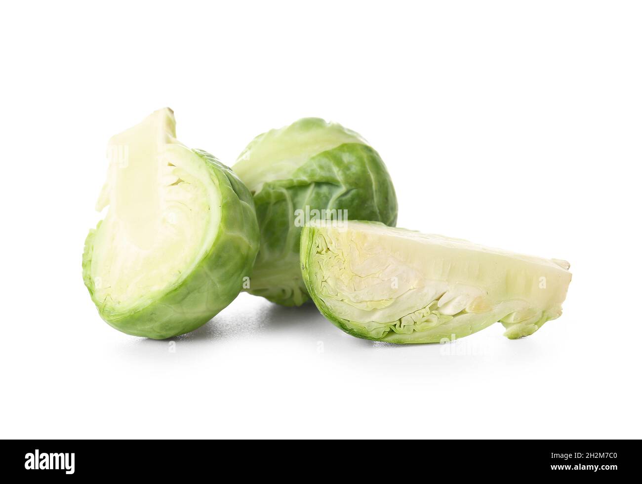 Cut ripe Brussels cabbage on white background Stock Photo - Alamy