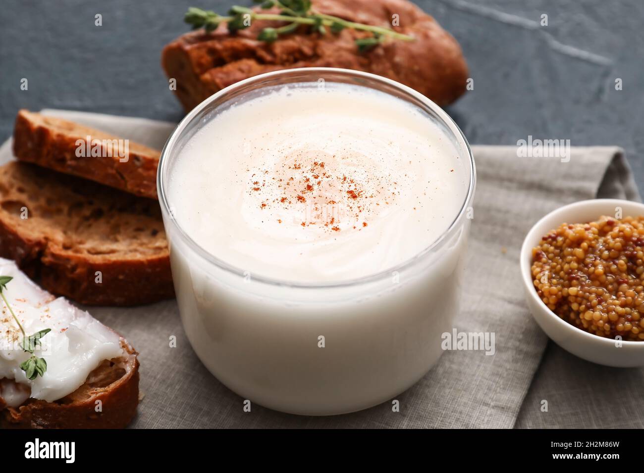 Jar of lard spread on black background Stock Photo - Alamy