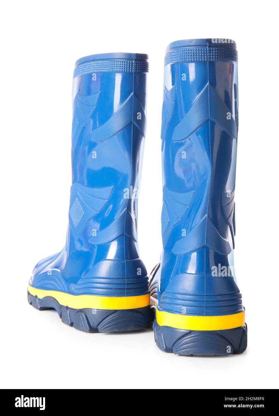 Pair of blue rubber boots on white background Stock Photo - Alamy