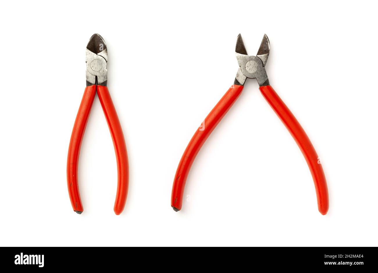 Old wire cutters with red handle isolated on white background Stock ...