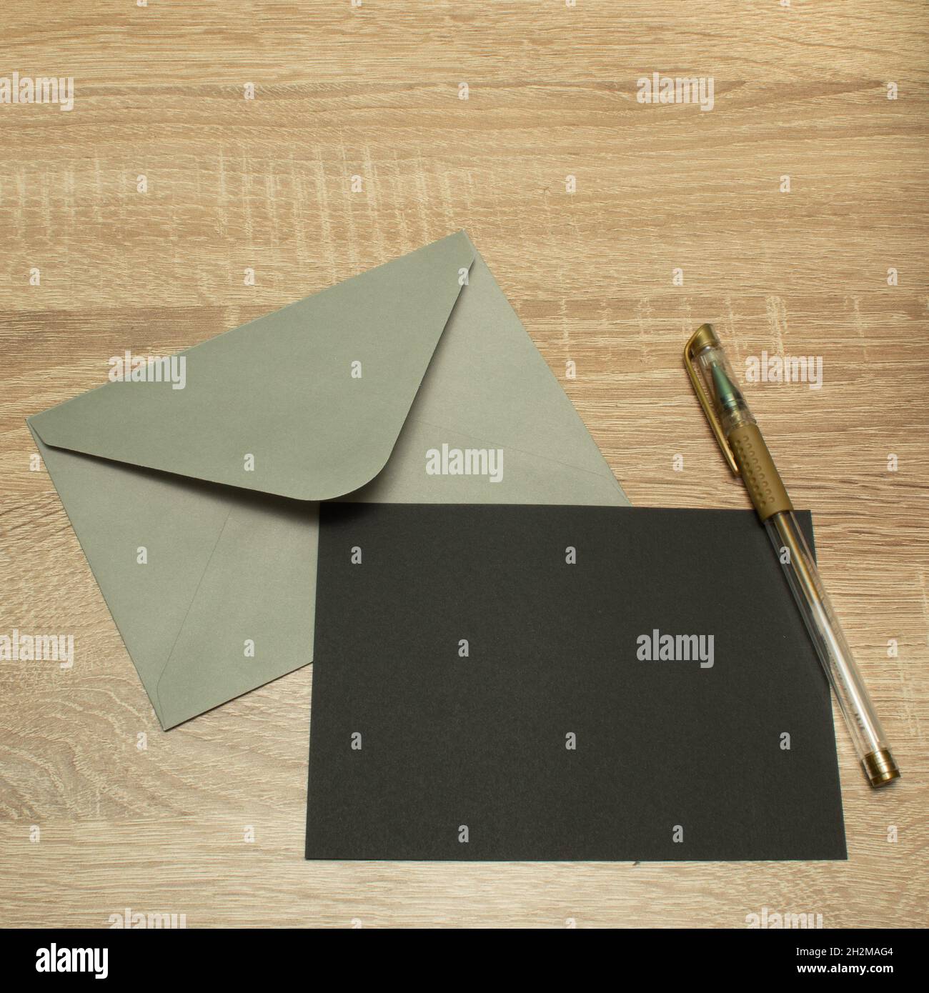 Gray letter with copy space. Minimal flat lay Stock Photo - Alamy