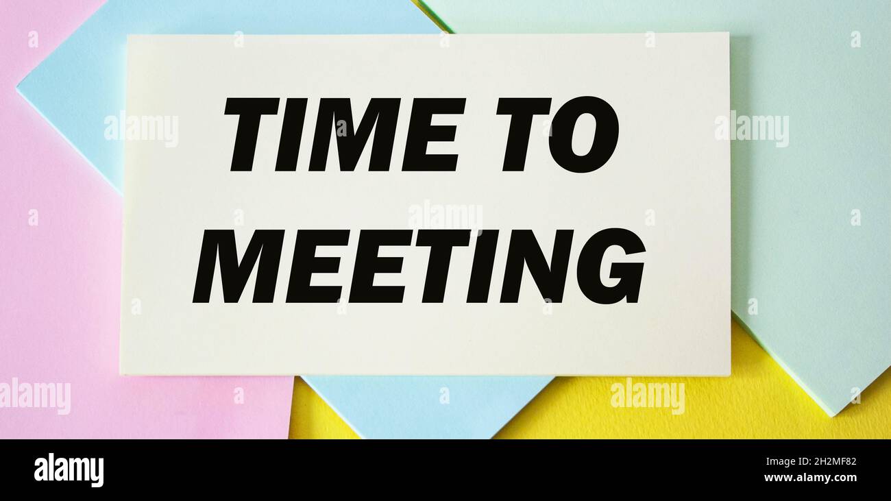 Time for a meeting text is written on colored stickers Stock Photo - Alamy