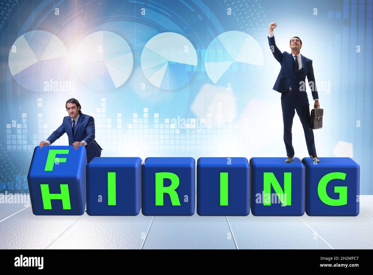Hiring and firing concept with the turning cubes Stock Photo - Alamy