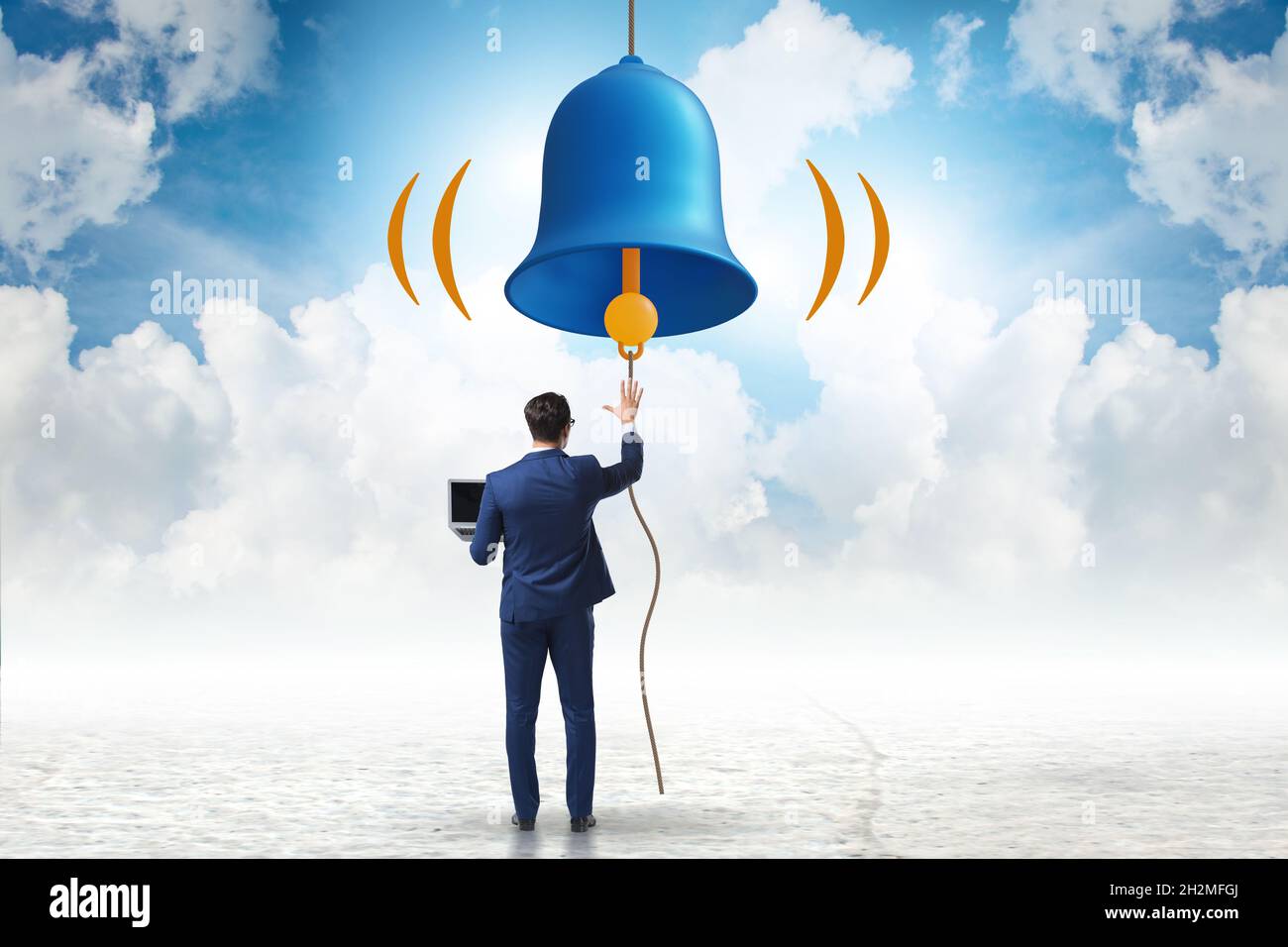 Businessman ringing the bell in case of the danger Stock Photo - Alamy