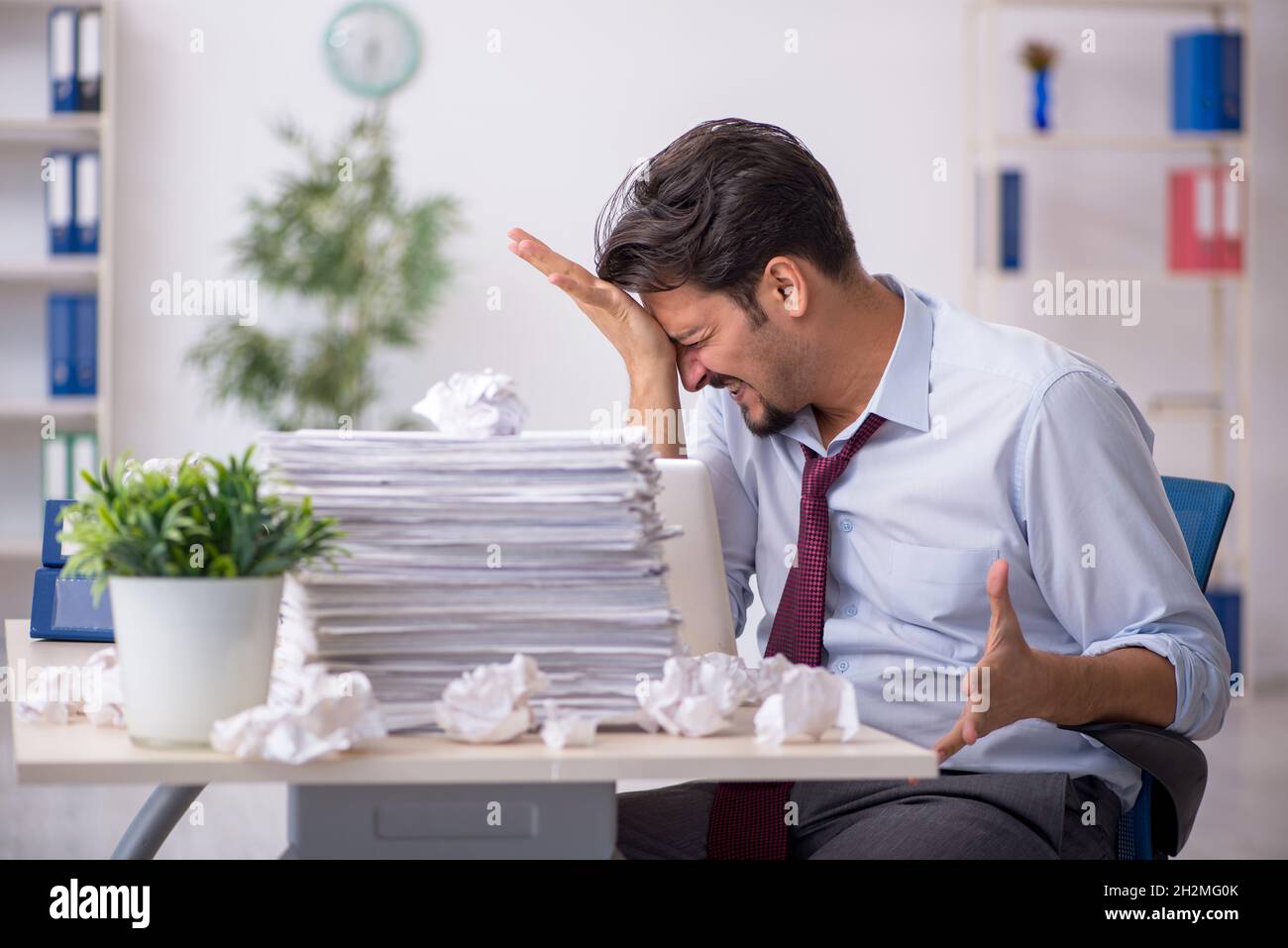 Young businessman employee in rejected ideas concept Stock Photo - Alamy