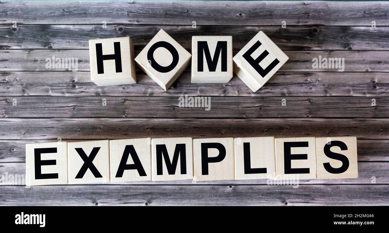 Home examples, text on wooden cubes and brown background Stock Photo ...