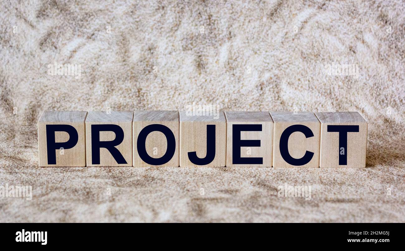 The word project in wooden cubes, blocks on the topic of business ...