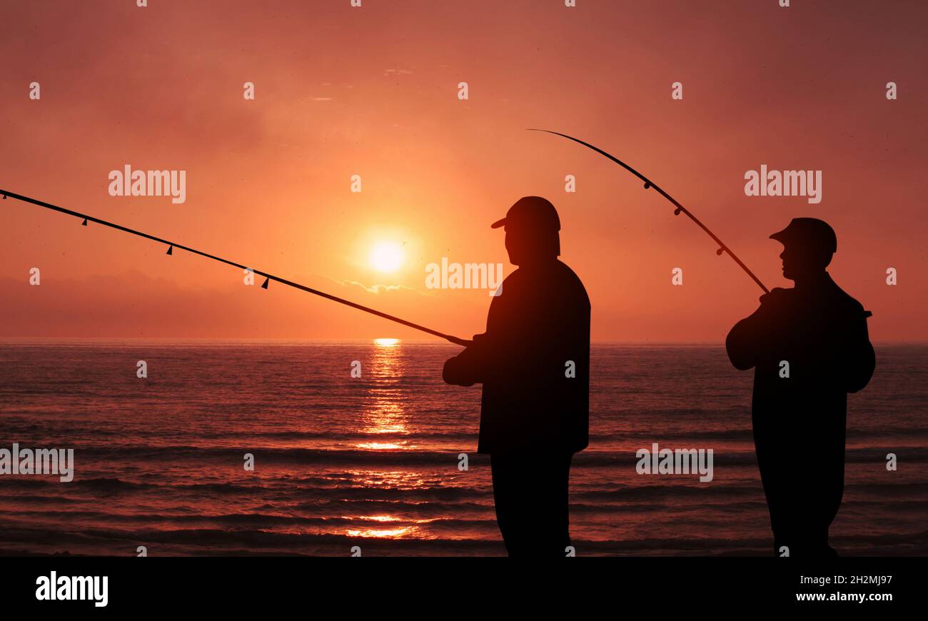 Best Friends Fishing Together At sunrise On the Cost. 2 fisher man ...