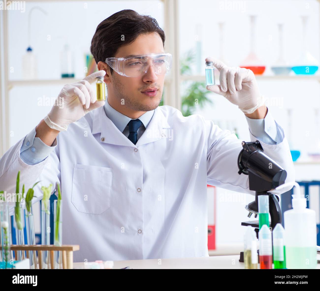 Science vials plant hi-res stock photography and images - Alamy