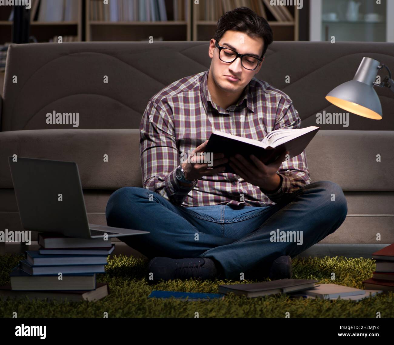 The student reading books preparing for exams Stock Photo - Alamy