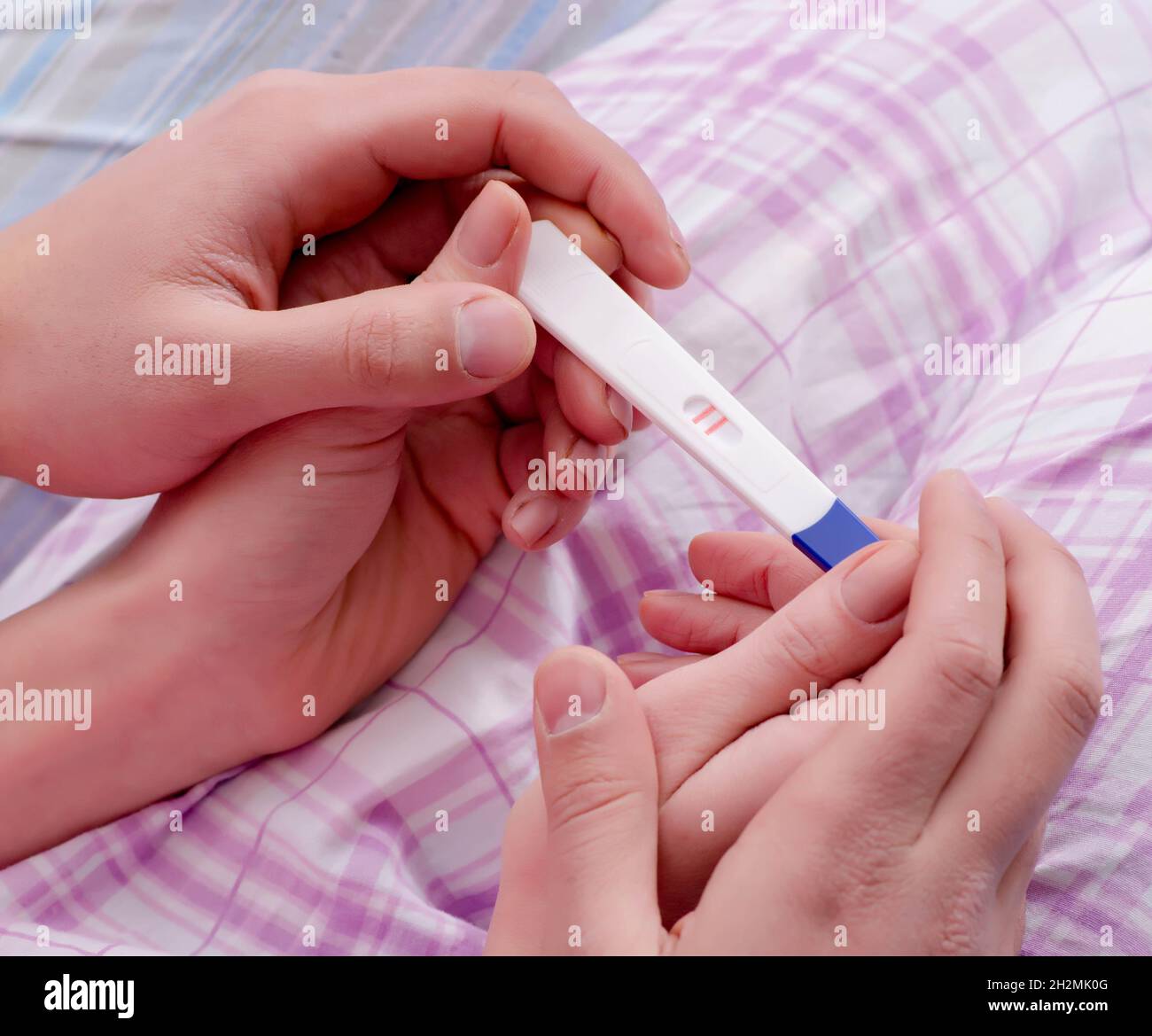 The woman discovering her positive pregnancy test Stock Photo - Alamy