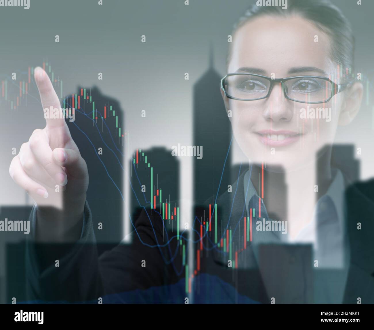 The businesswoman pressing buttons on line chart Stock Photo - Alamy