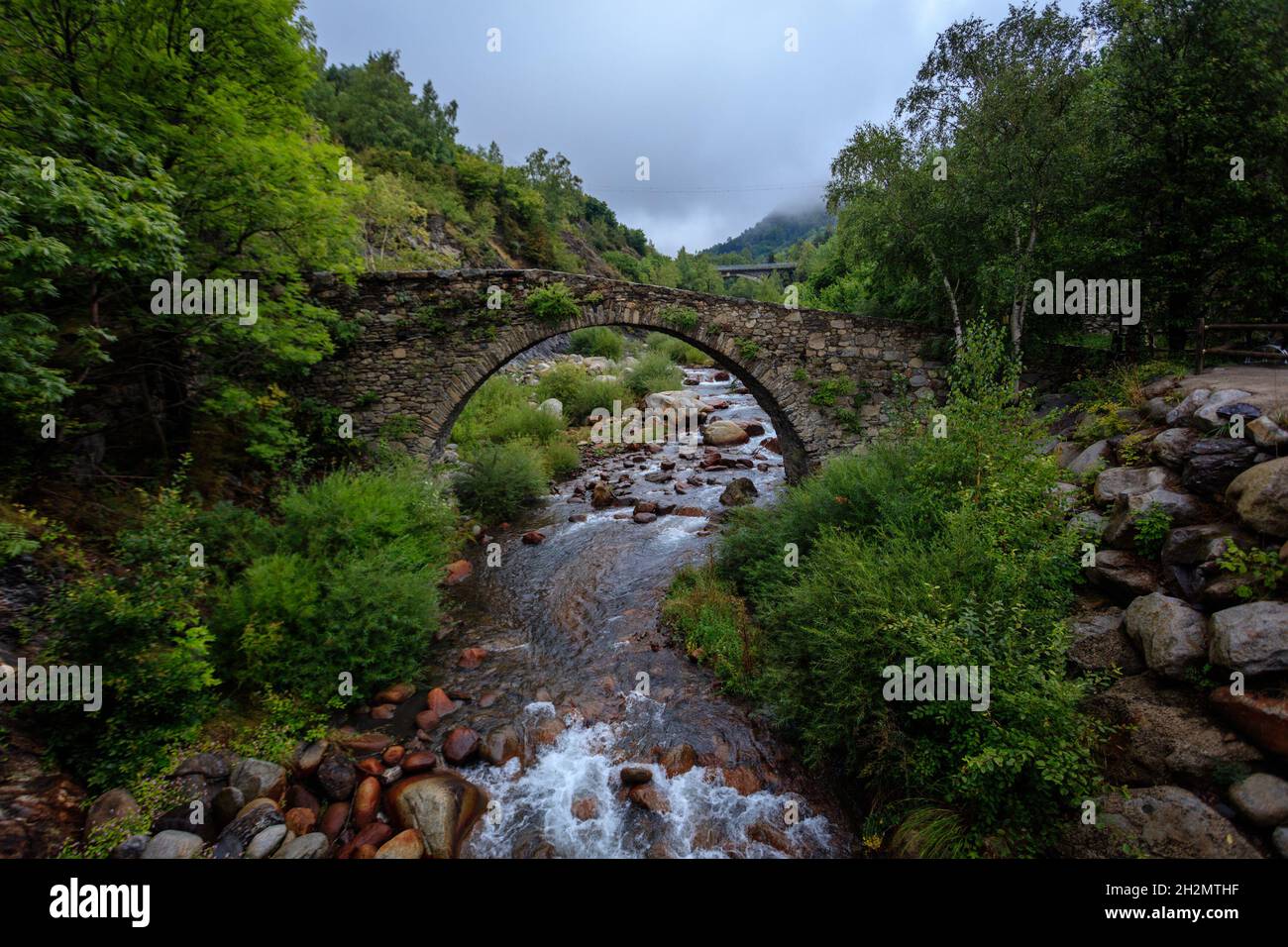 Bridge over the Esera river in the Benasque valley around the Aneto ...
