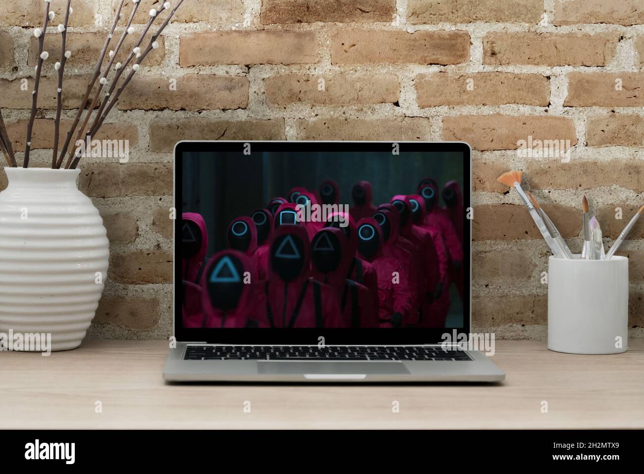 Squid Game Wallpapers with soldiers Stock Photo - Alamy