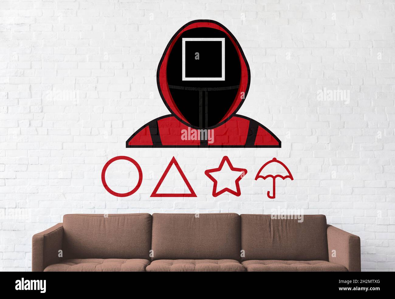 Squid Game Wallpapers with figure on the wall Stock Photo - Alamy