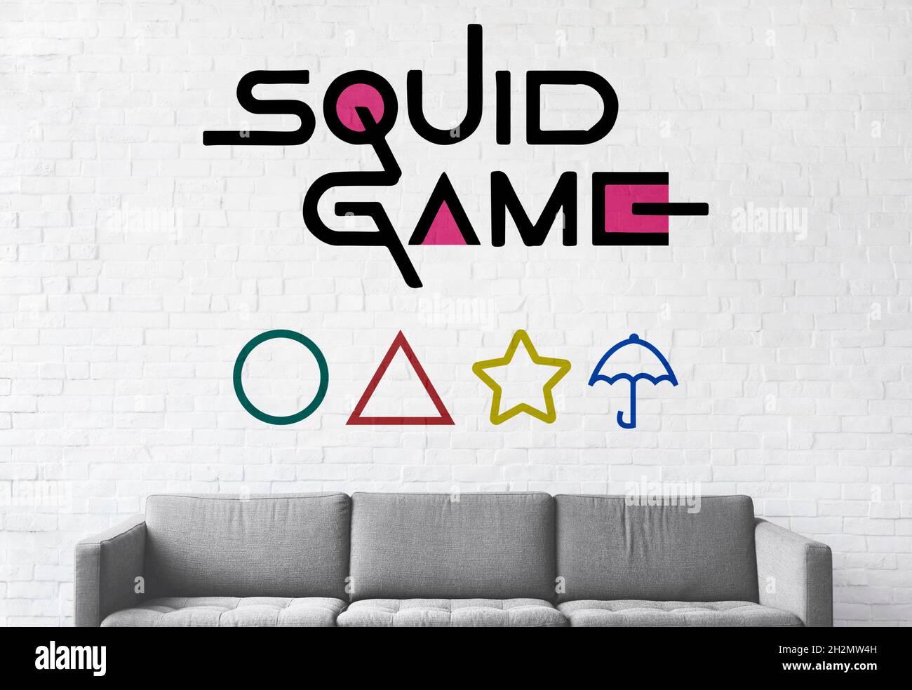 Squid Game Wallpapers with figure on the wall Stock Photo - Alamy