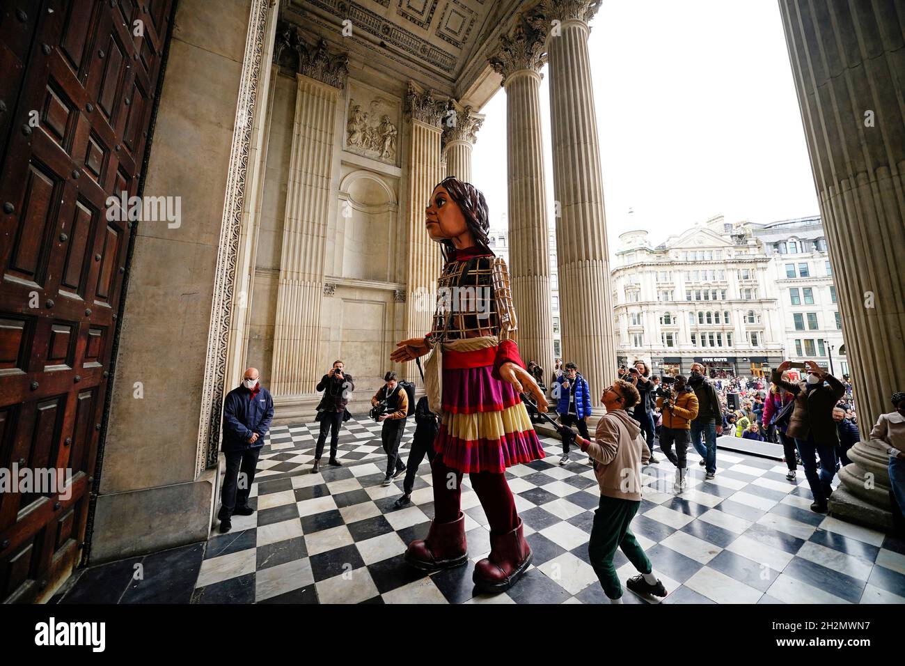 Little Amal, a 3.5-metre-tall puppet of a nine-year-old Syrian girl, at ...