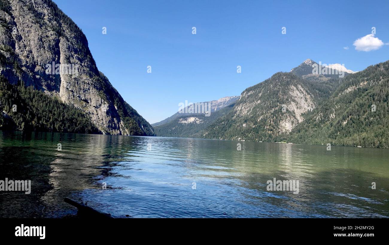 Beautiful landscape of a river between mountains on a sunny day Stock ...