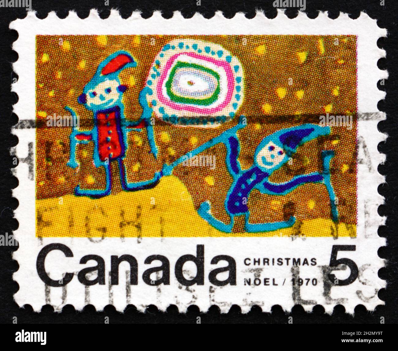 CANADA - CIRCA 1970: a stamp printed in Canada shows children skiing ...