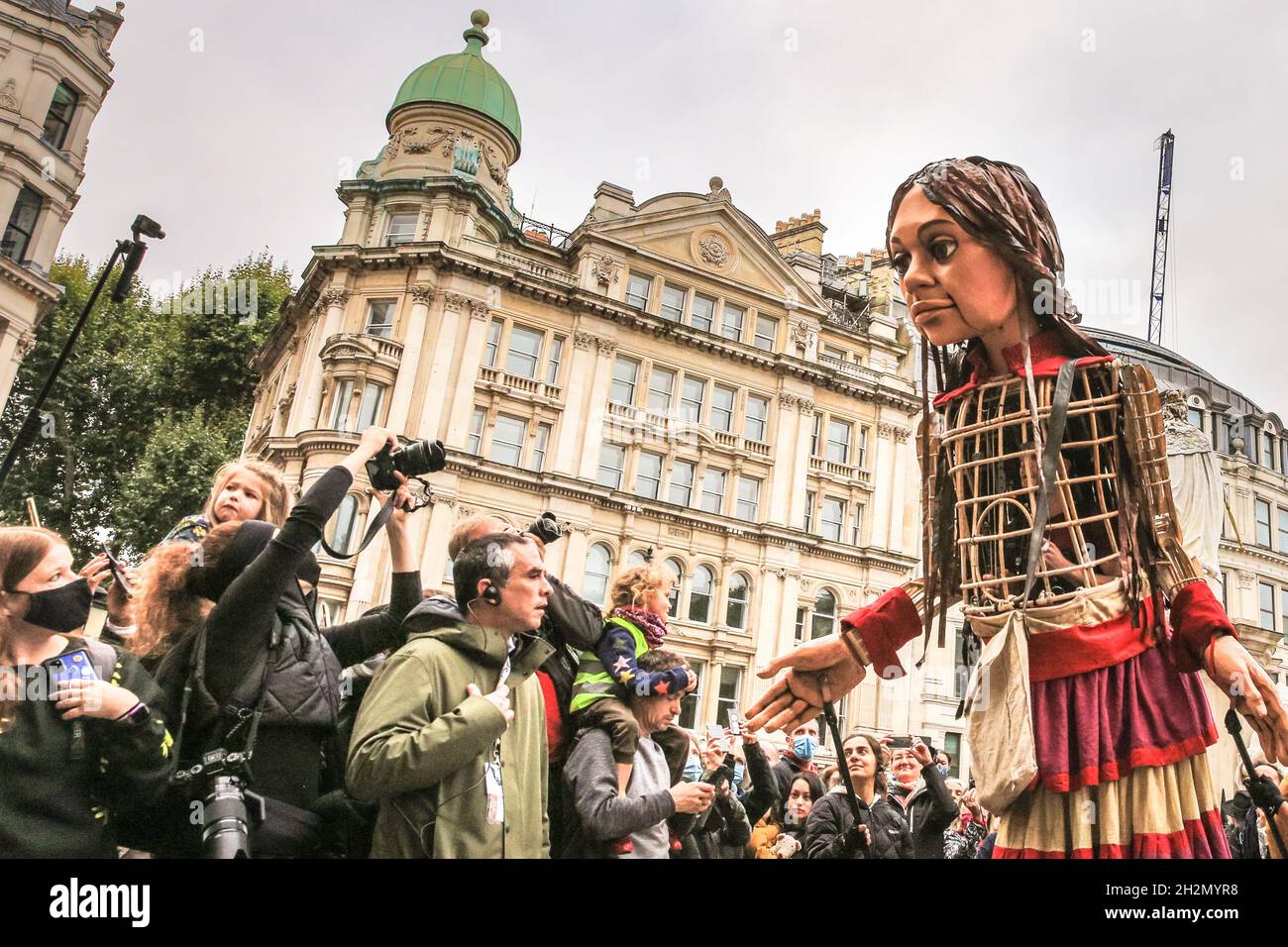 St Paul's Cathedral, London, UK. 22nd Oct, 2021. Giant refugee puppet ...