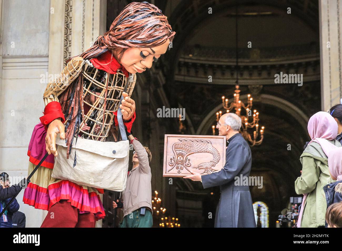 St Paul's Cathedral, London, UK. 22nd Oct, 2021. Giant refugee puppet ...