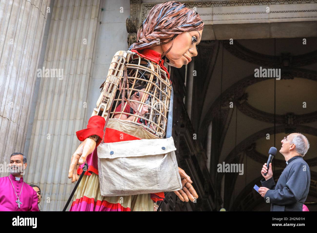 St Paul's Cathedral, London, UK. 22nd Oct, 2021. Giant refugee puppet ...