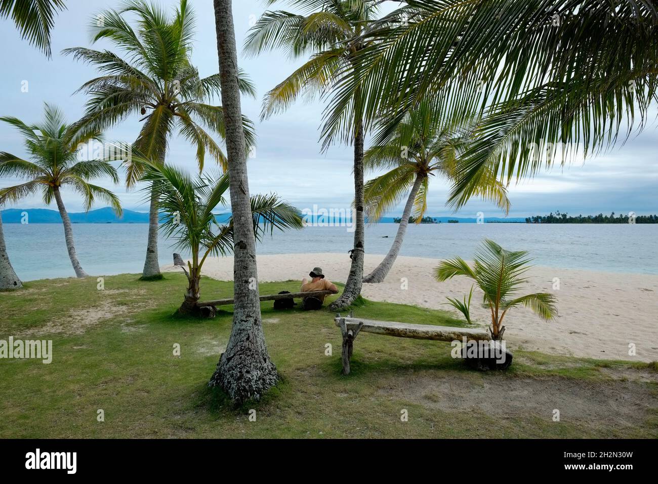 A tourist resting in a small island called Isla Pelicano or Pelican ...