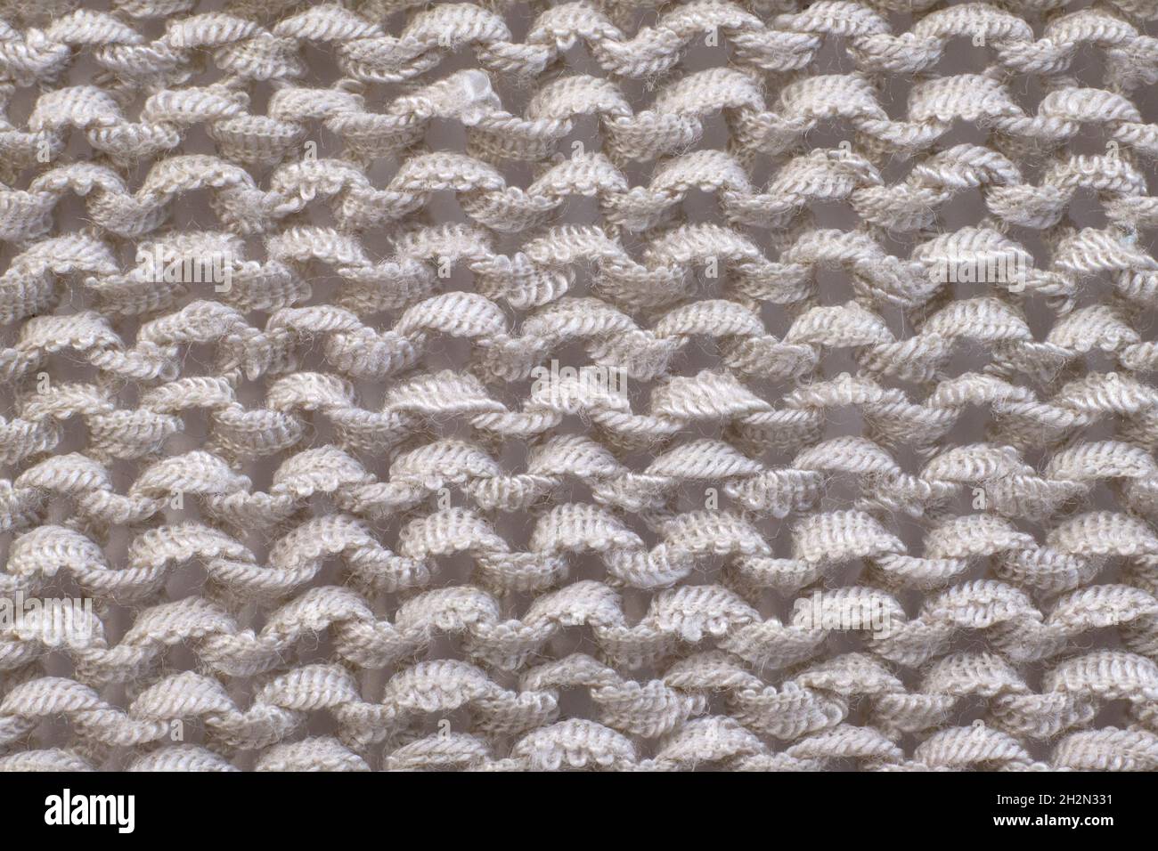 Soft light natural texture of knitted wool textile material background ...
