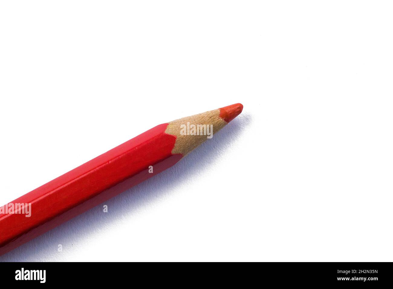 Red pencil isolated on white background Narrow focus line, shallow ...