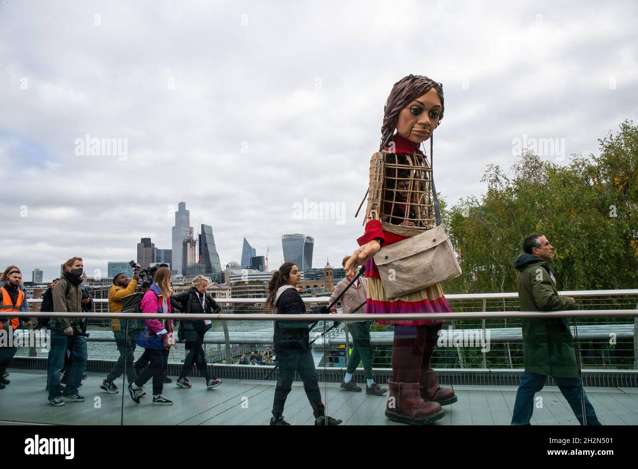 London, UK. 23rd Oct, 2021. Little Amal, a 3.5m-tall puppet ...