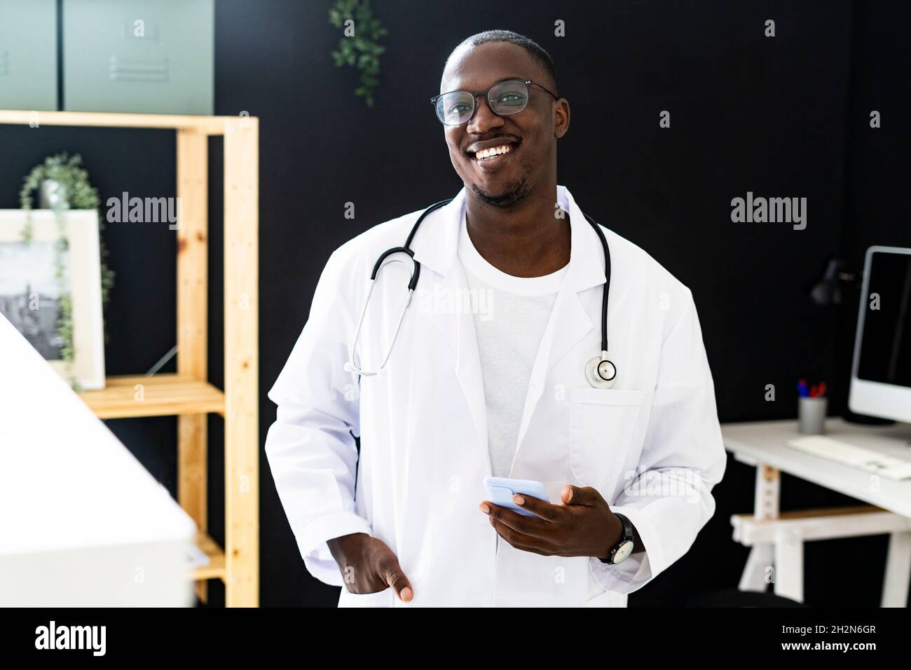 Happy african american male doctor hi-res stock photography and images ...