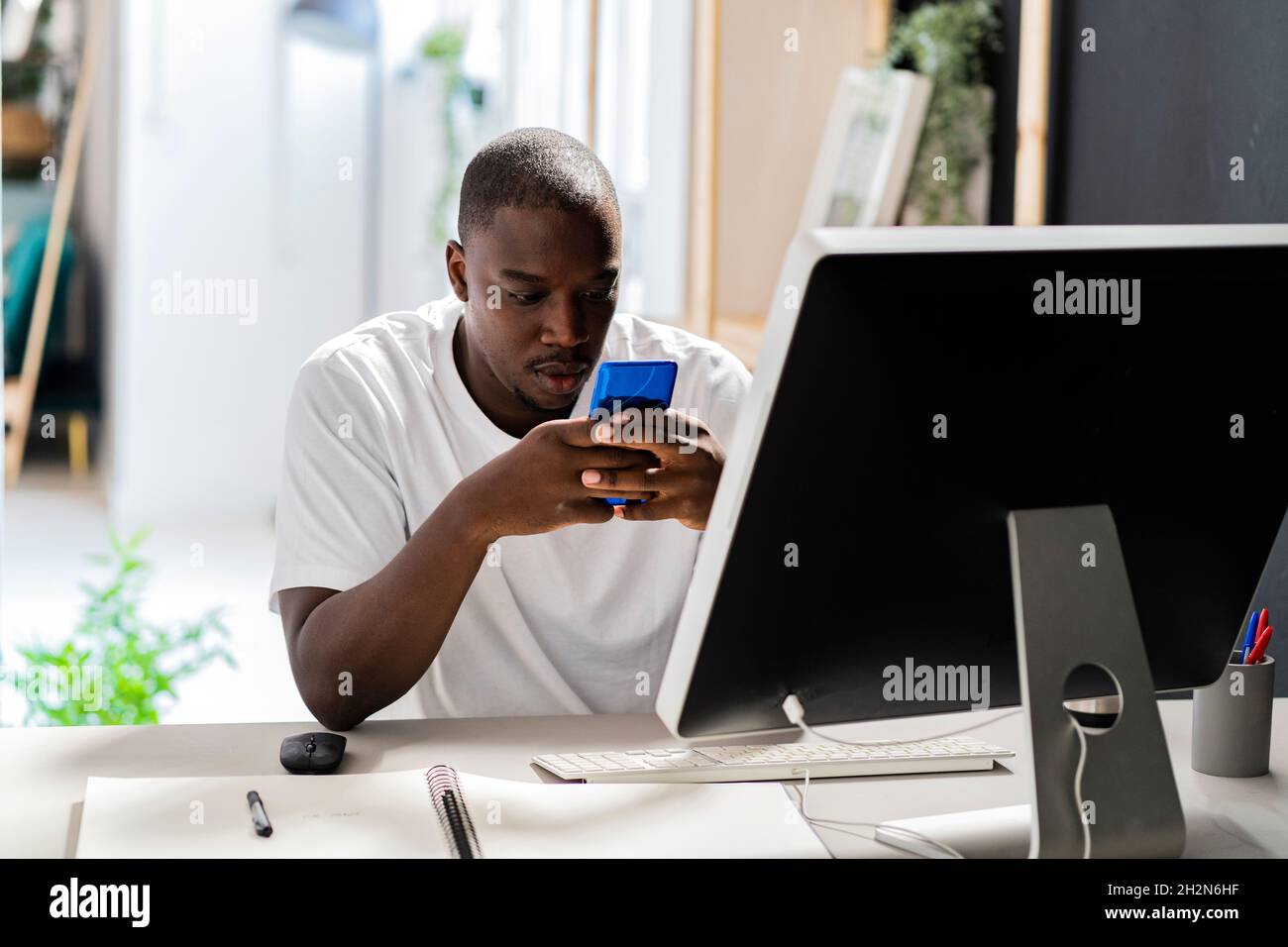 African american worker sitting desk hi-res stock photography and ...
