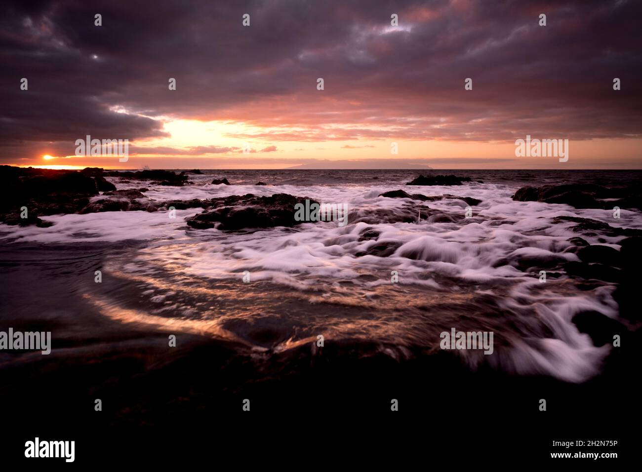 Coastal landscape at dramatic sunset Stock Photo - Alamy