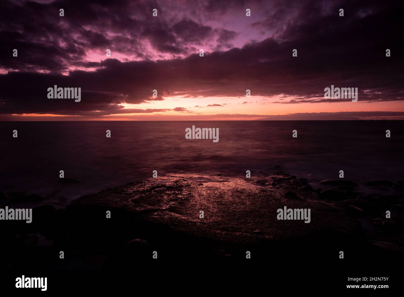 Coastal landscape at dramatic sunset Stock Photo - Alamy