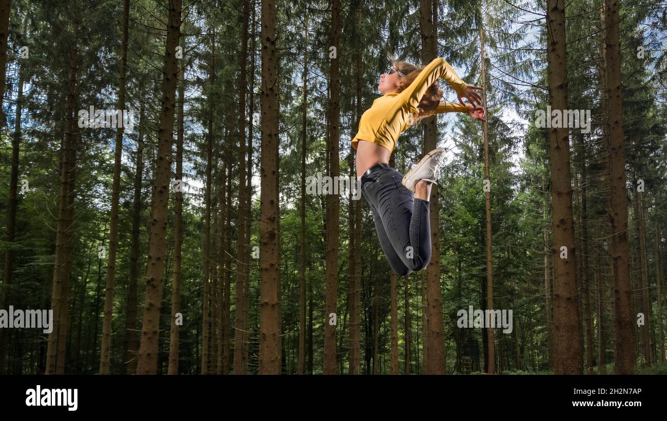 Jumping tree mid air vitality hi-res stock photography and images - Alamy