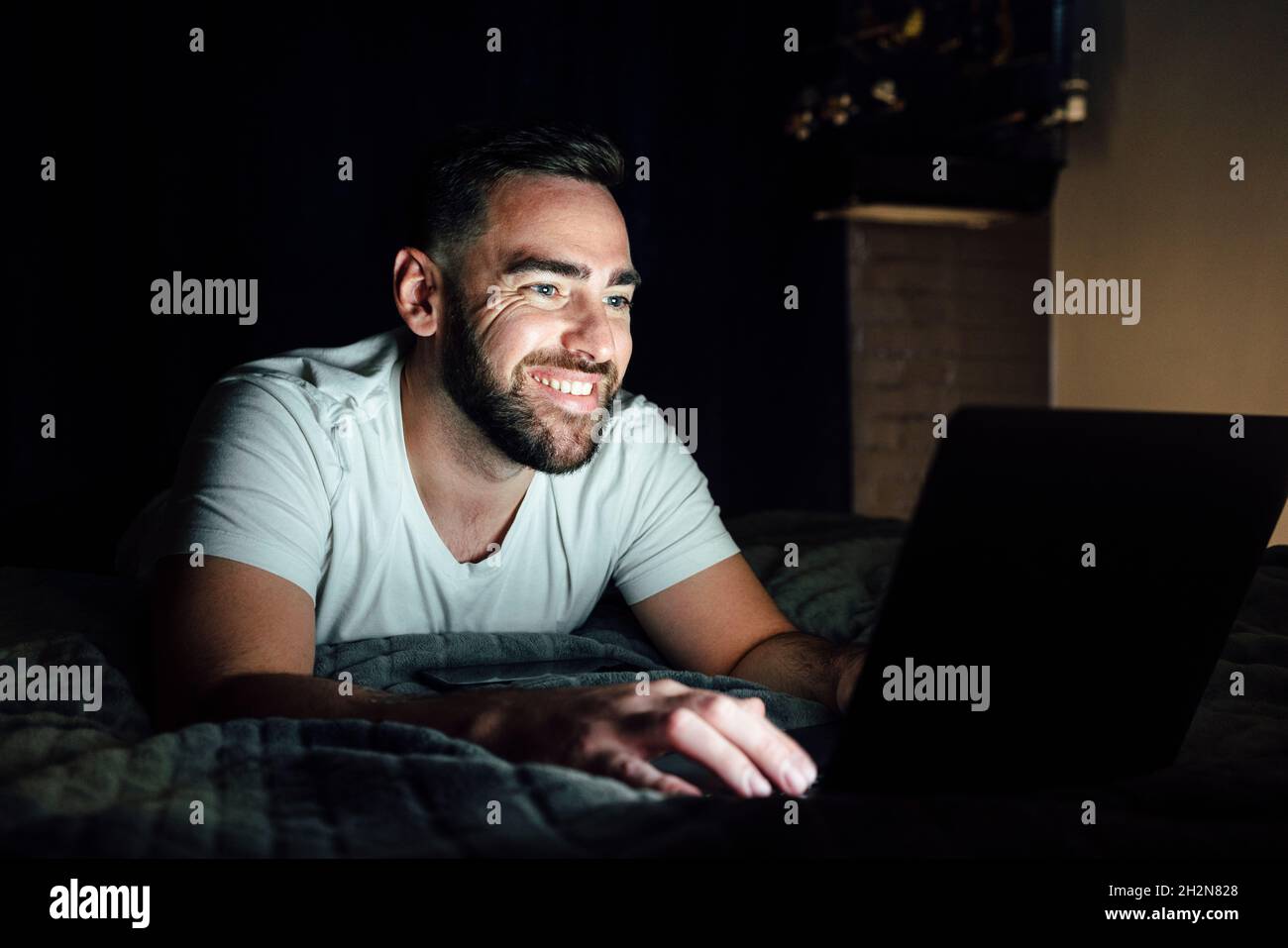 Person computer dark room hi-res stock photography and images - Alamy