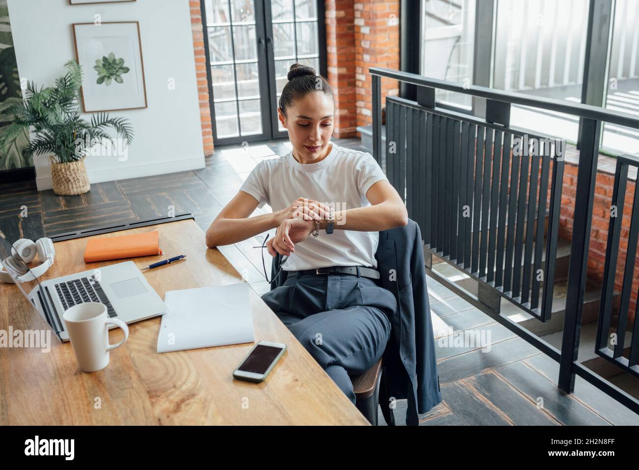 Checking the time table hi-res stock photography and images - Alamy