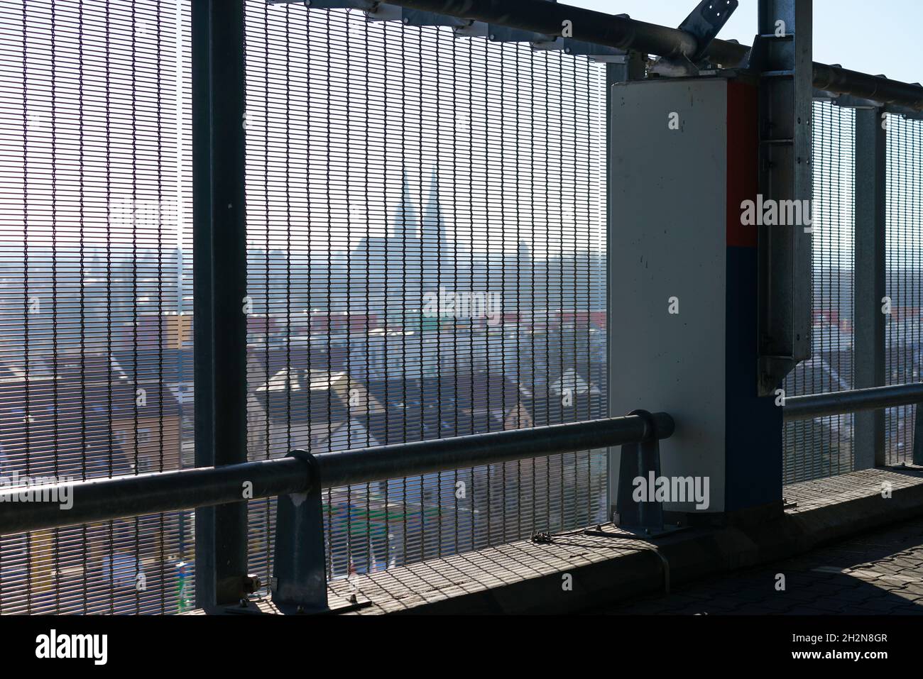 City viewed from behind the fence Stock Photo - Alamy